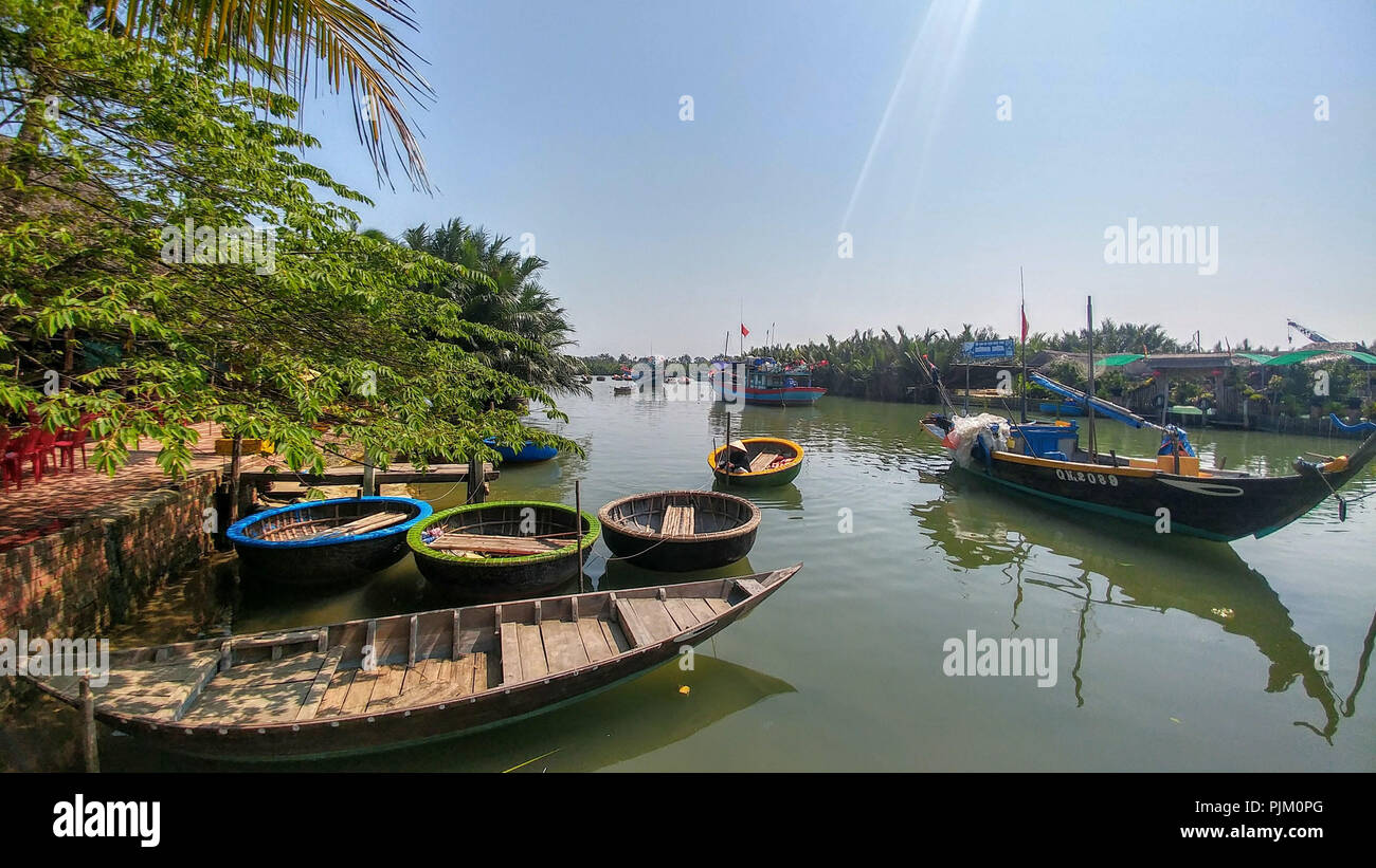 Nutshell boats on the water in Vietnam Stock Photo - Alamy