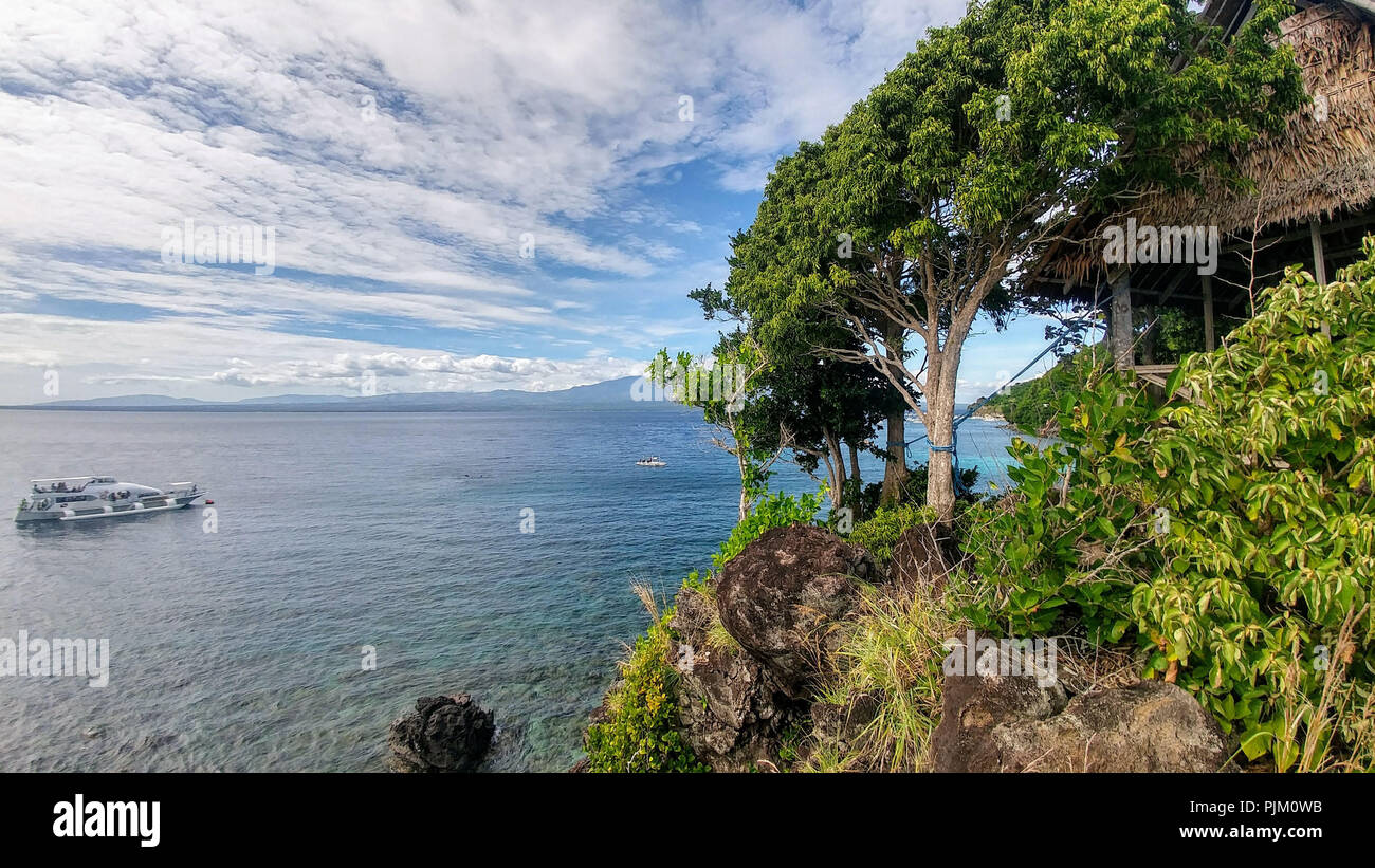 Wooden hut on apo island hi-res stock photography and images - Alamy