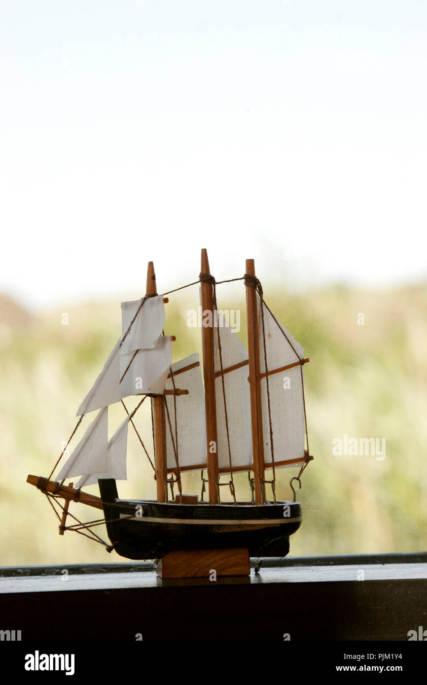 Summer house, window, sailboat, ship model Stock Photo - Alamy