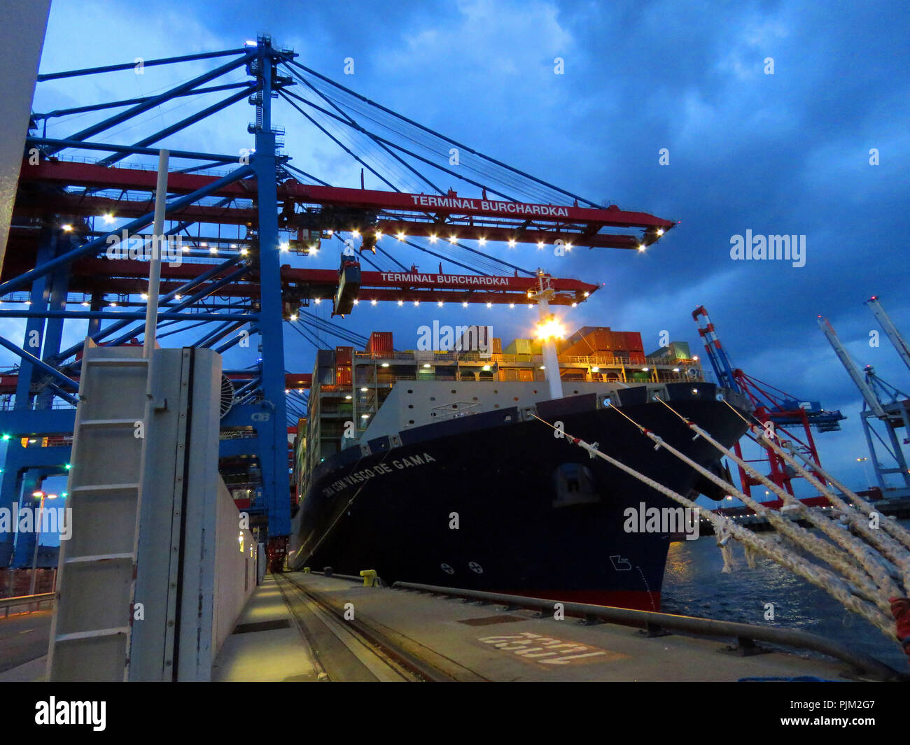 Container ship at the terminal Stock Photo - Alamy