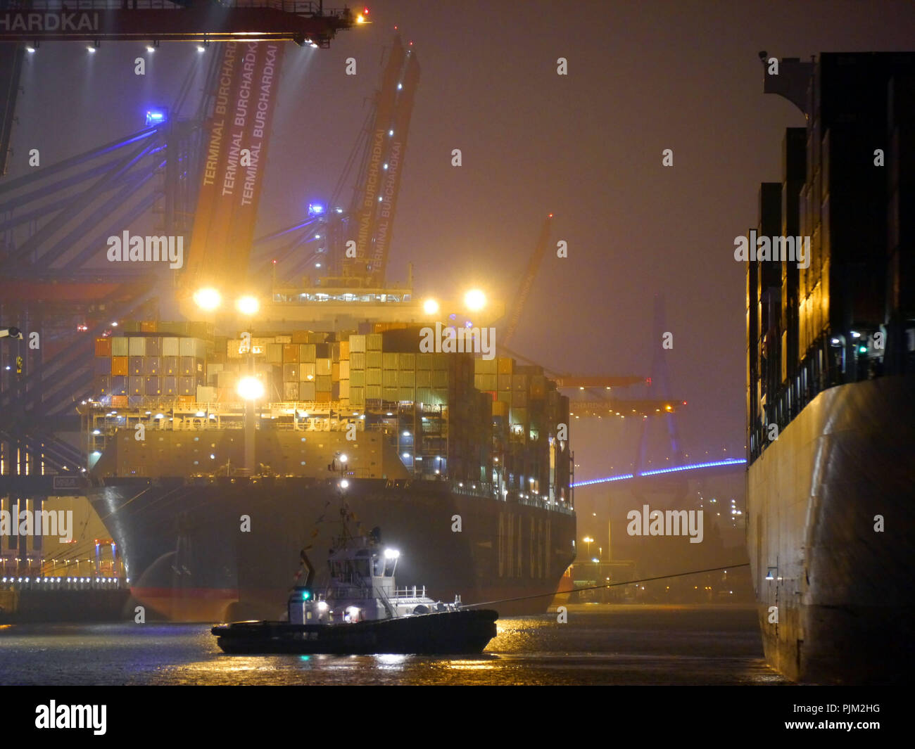 Container terminal by night Stock Photo - Alamy