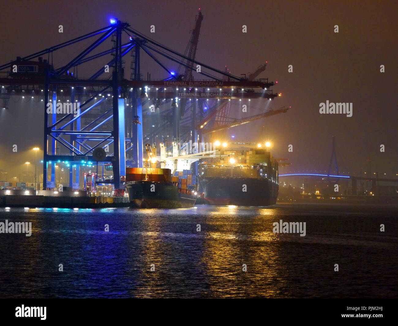 Container terminal by night Stock Photo - Alamy