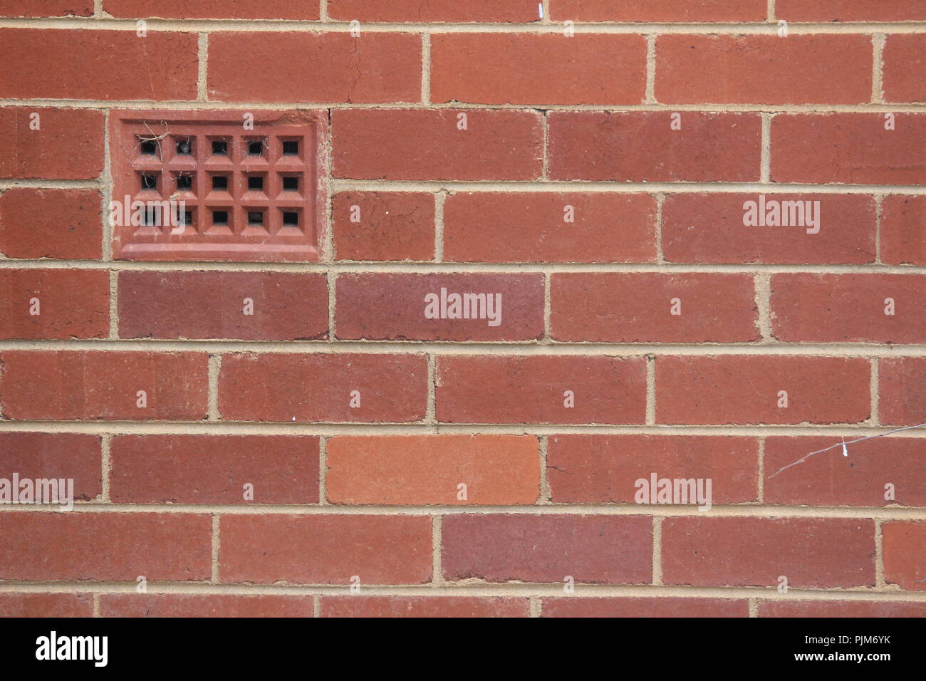 Vent in an old fashioned brick wall in Queanbeyan. NSW, Australia Stock ...