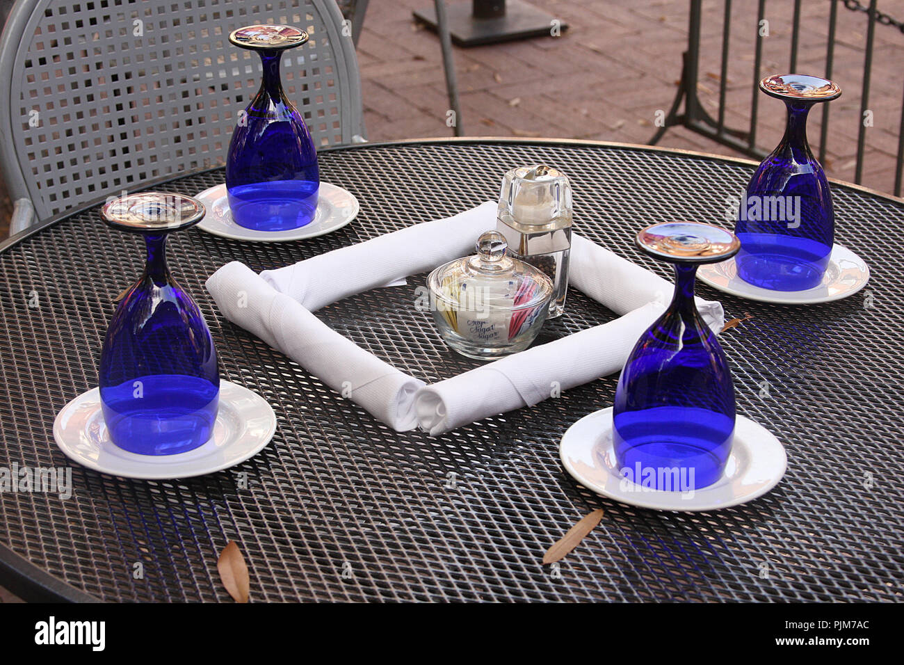 Table setting at outside terrace of restaurant Stock Photo - Alamy