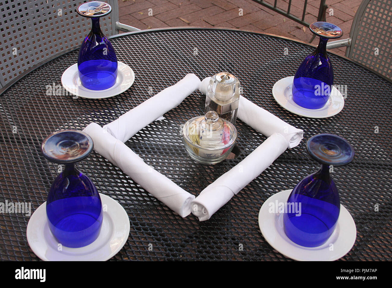 Table setting at outside terrace of restaurant Stock Photo - Alamy