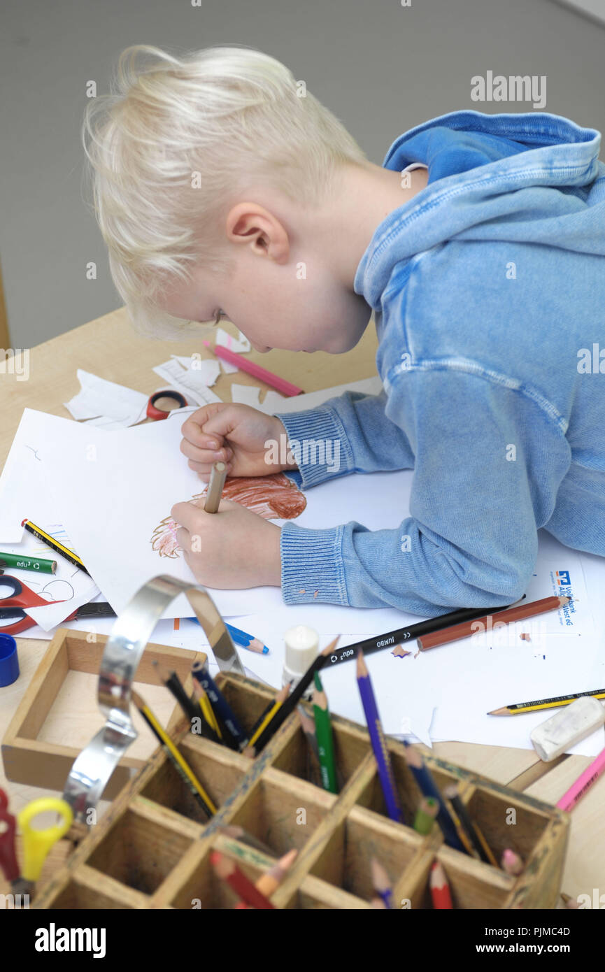 Boy Is Drawing A Picture High Resolution Stock Photography and Images ...