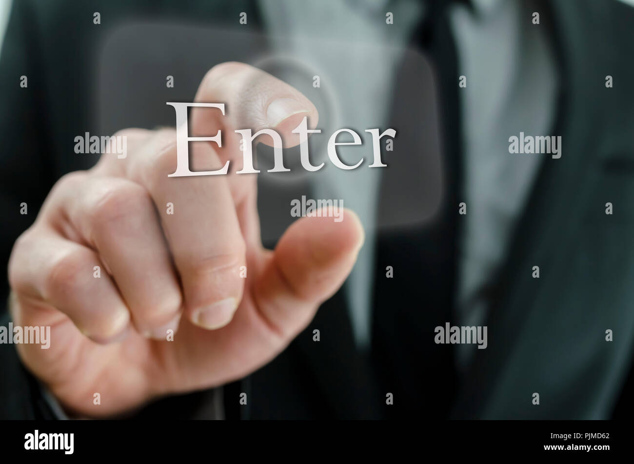 Business man pressing enter button on virtual screen Stock Photo - Alamy