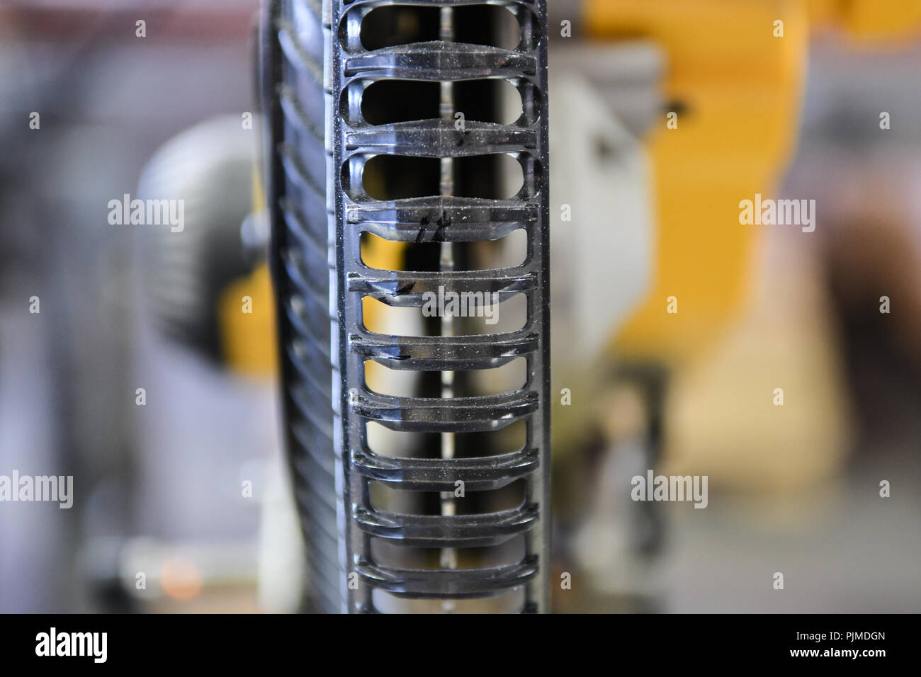 Construction equipment in warehouse use to build frames for new homes ...