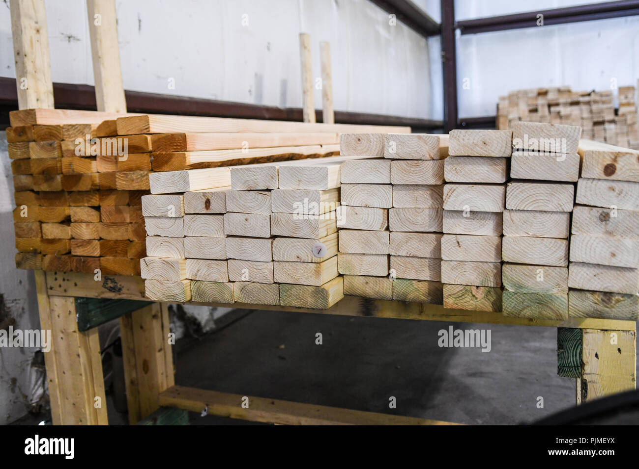 Wood in a construction warehouse for building new homes Stock Photo - Alamy