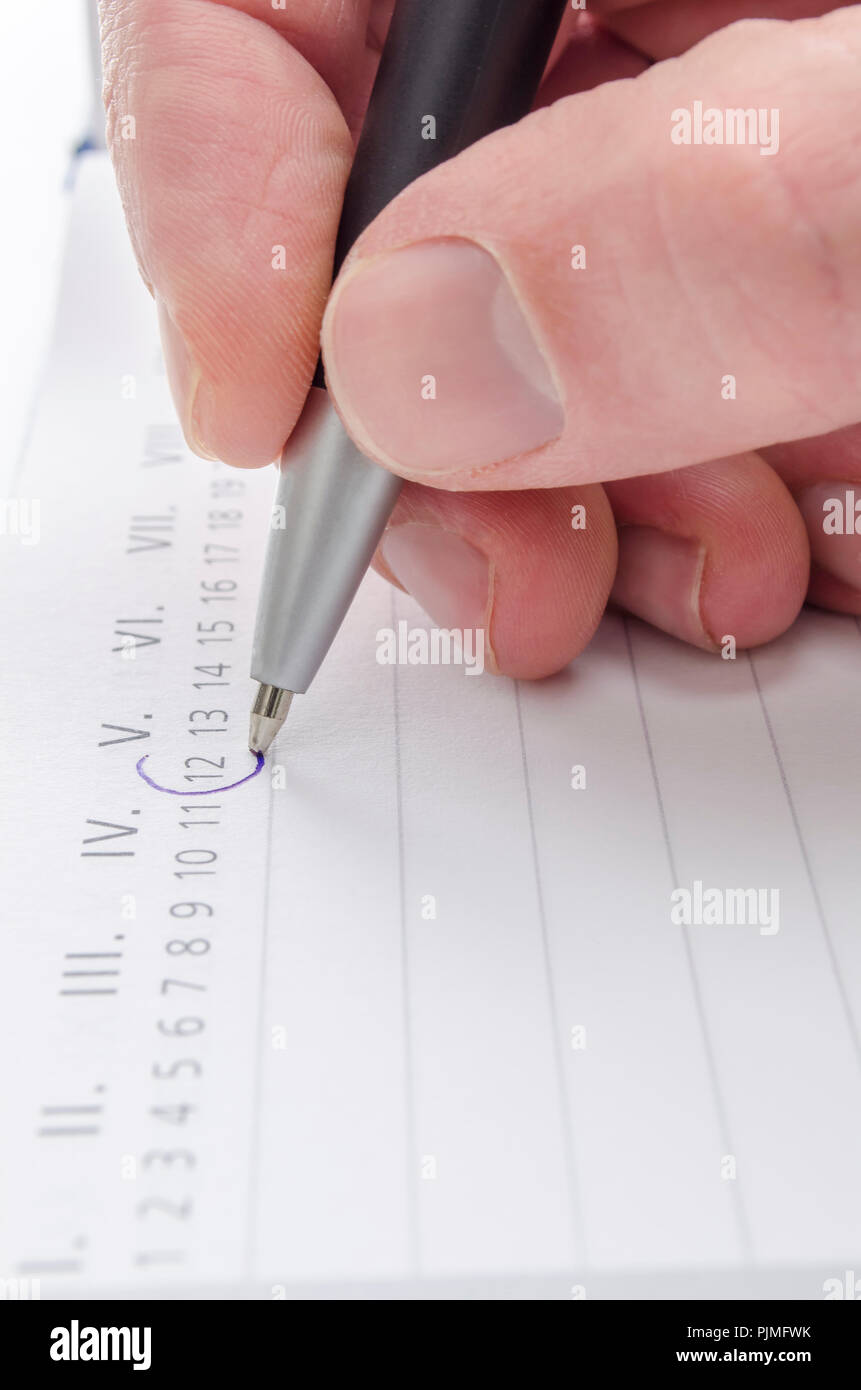 Black man writing on notepad hand hi-res stock photography and images ...