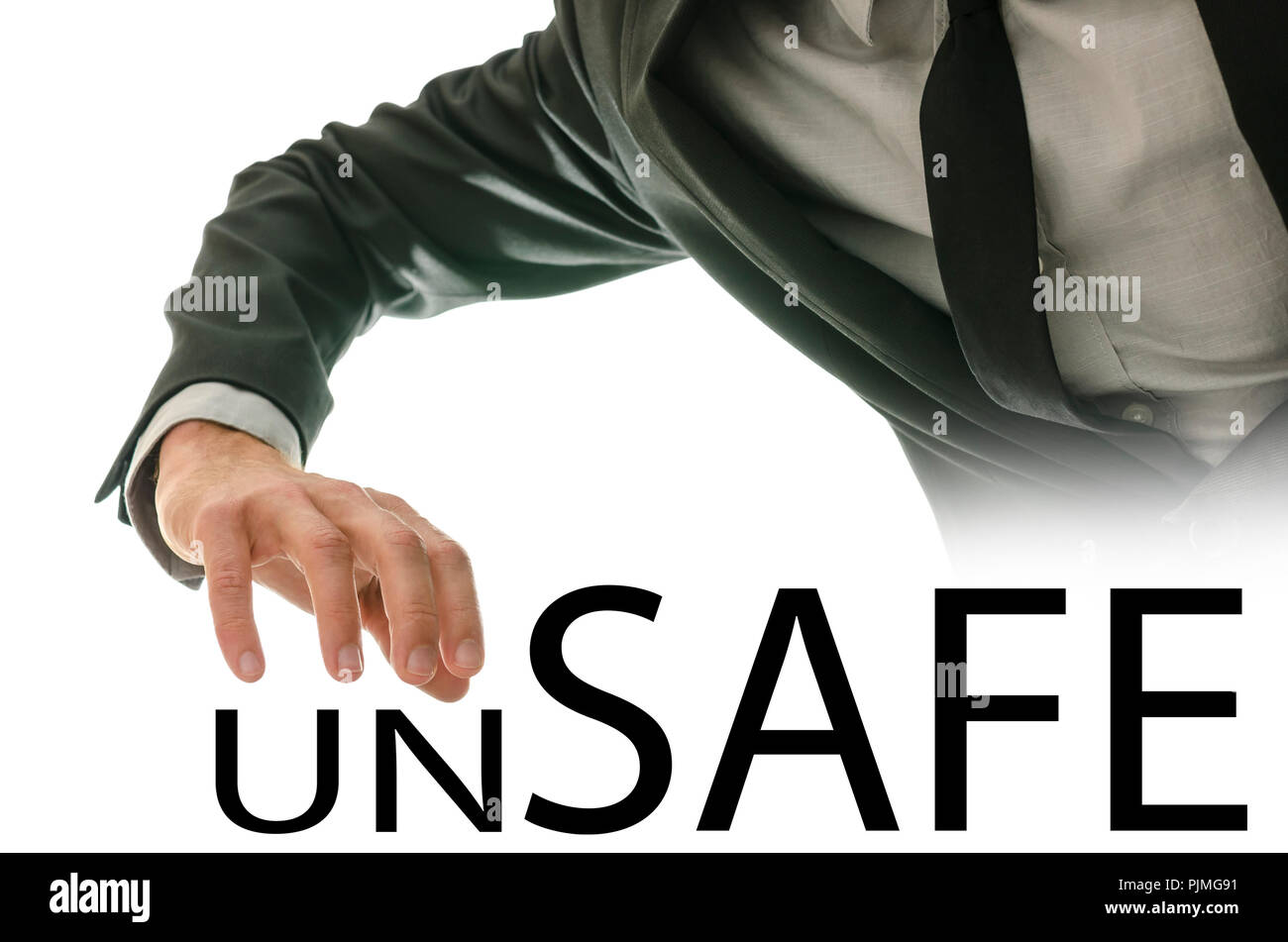Businessman reaching his hand for the text Unsafe - Safe in a ...