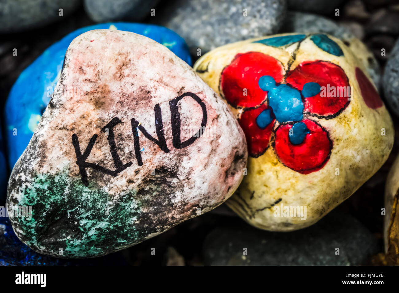 Stone painting - Flower and KIND Stock Photo - Alamy