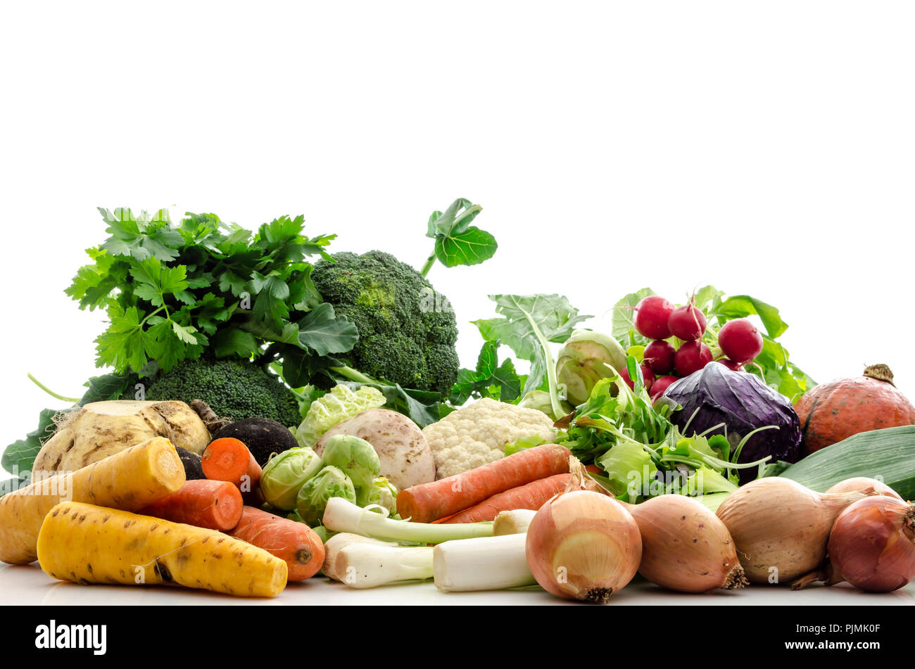 Organic fresh vegetables from a bio-garden, isolated on a white ...