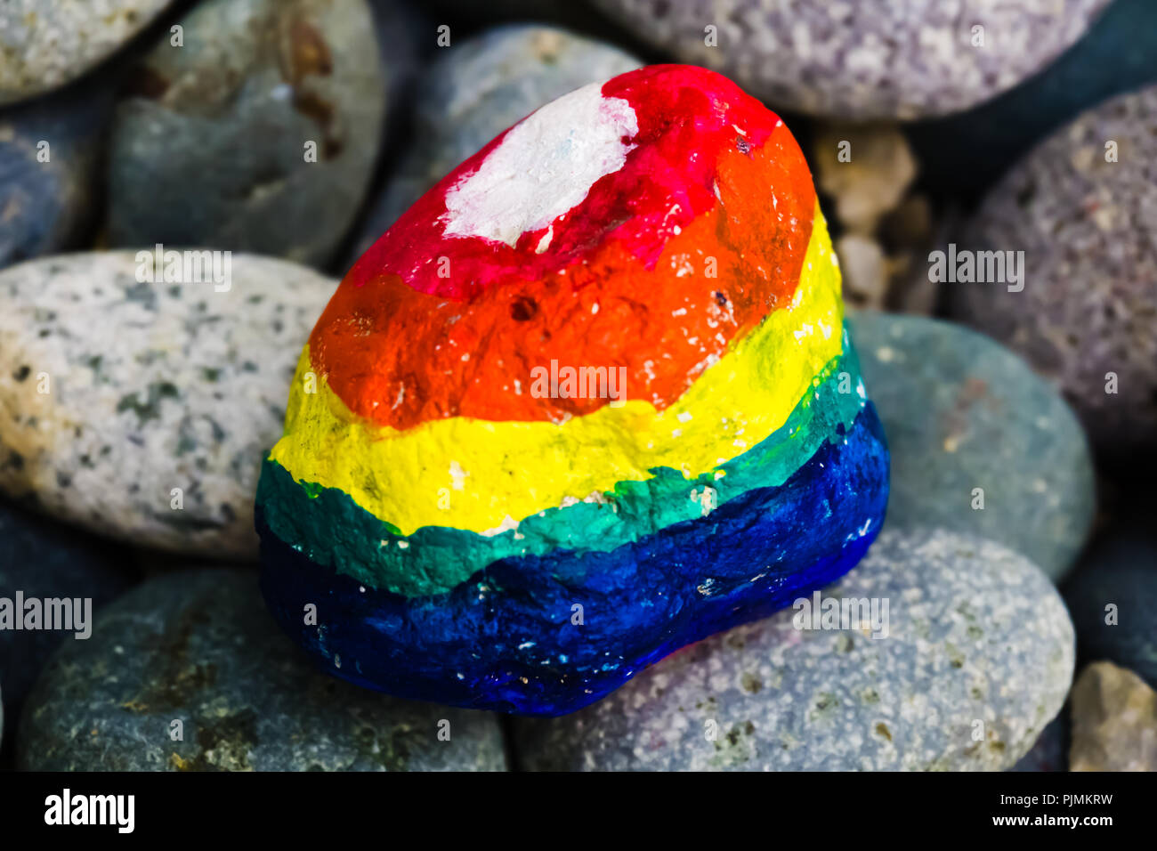 Child painting stones hi-res stock photography and images - Alamy