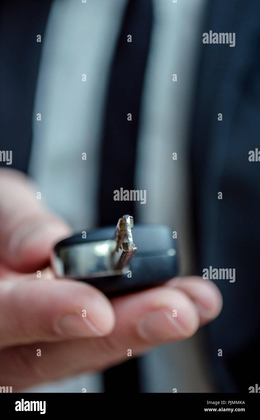 Businessman hand giving car hi-res stock photography and images - Alamy