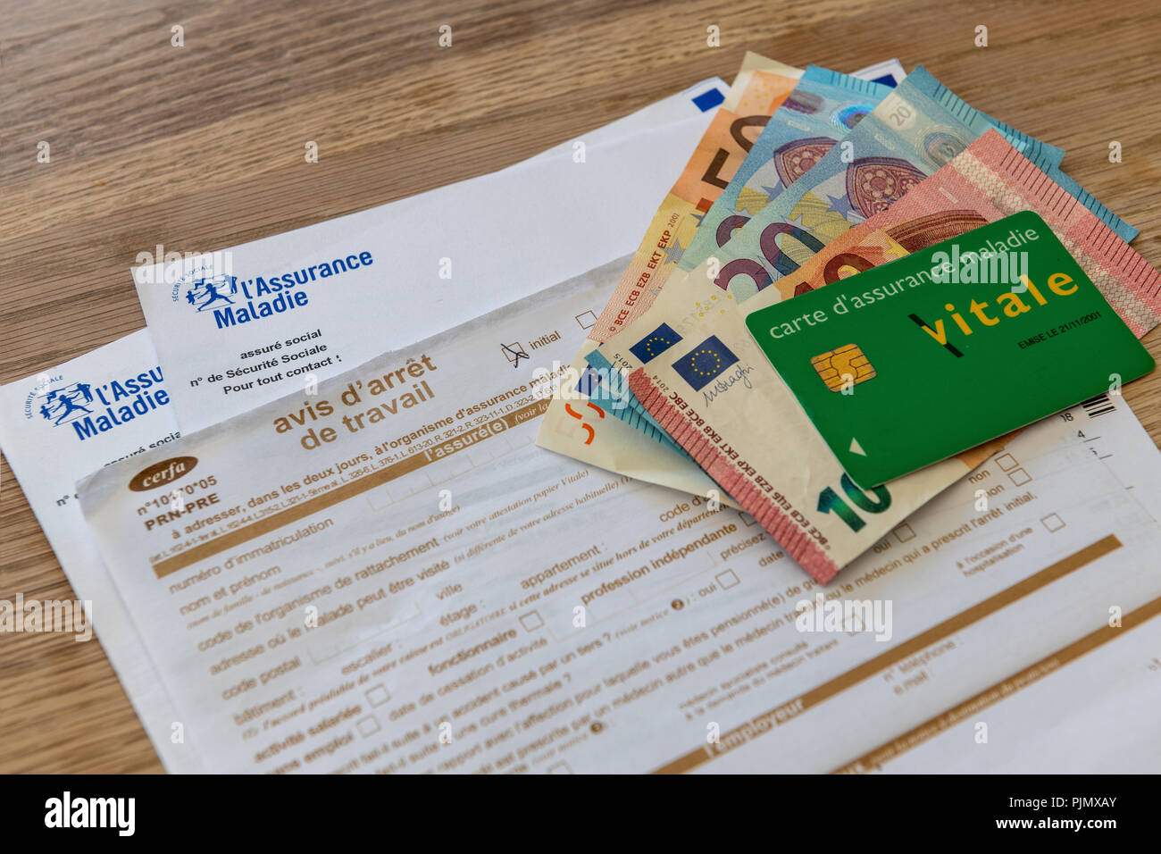 Sick leave and money hi-res stock photography and images - Alamy