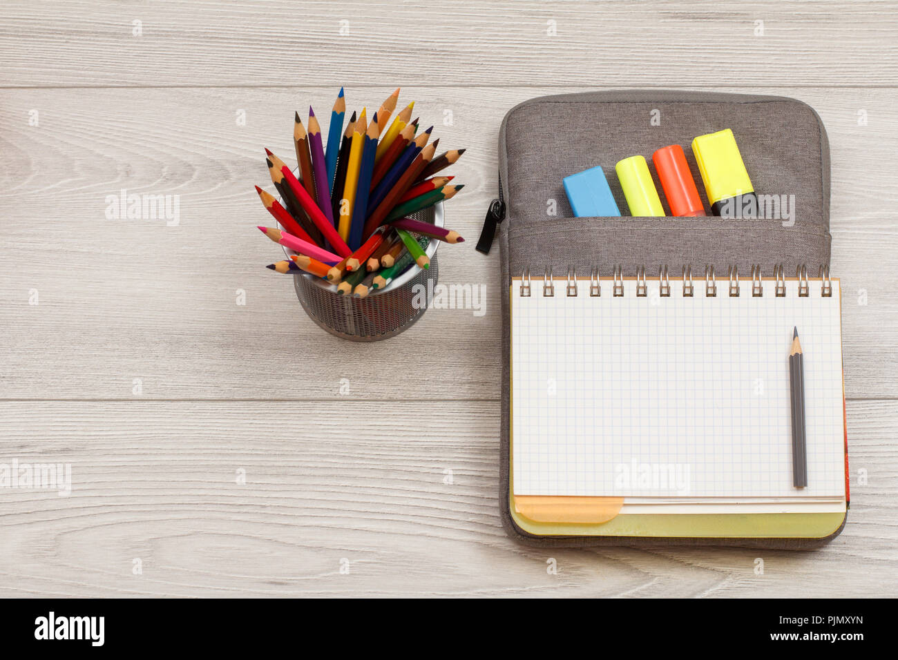 School supplies. Metal stand for pencils with color pencils, open ...