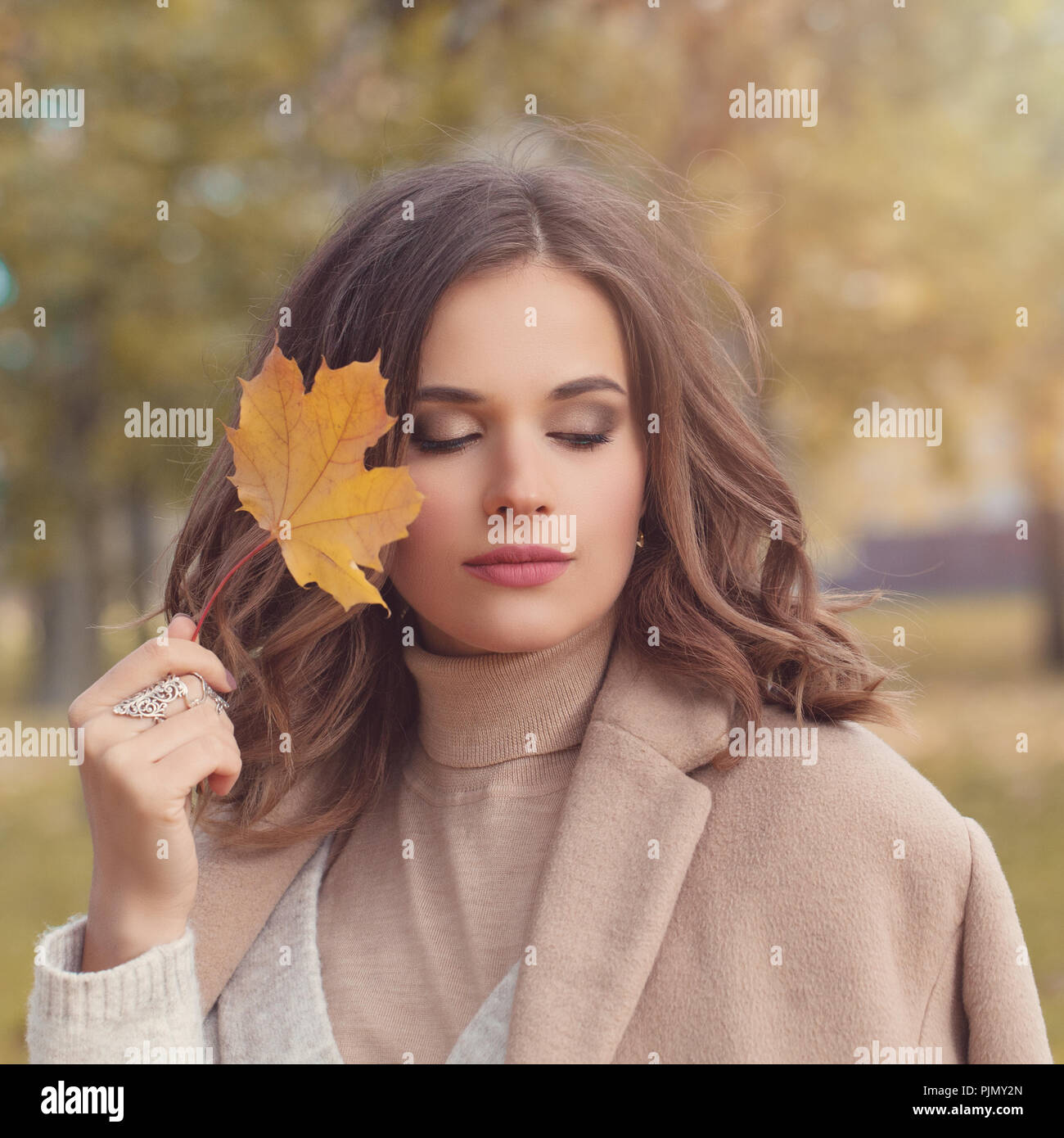 Autumn woman outdoor portrait. Perfect female model with healthy hair ...