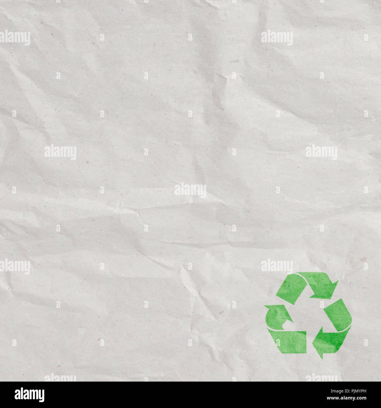 A recycled paper background with green sign Stock Photo - Alamy