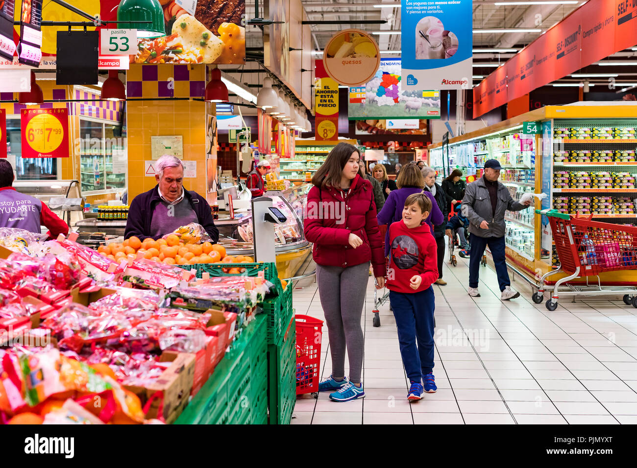 MADRID, SPAIN - 26 MARCH, 2018: Large food supermarket with customers ...