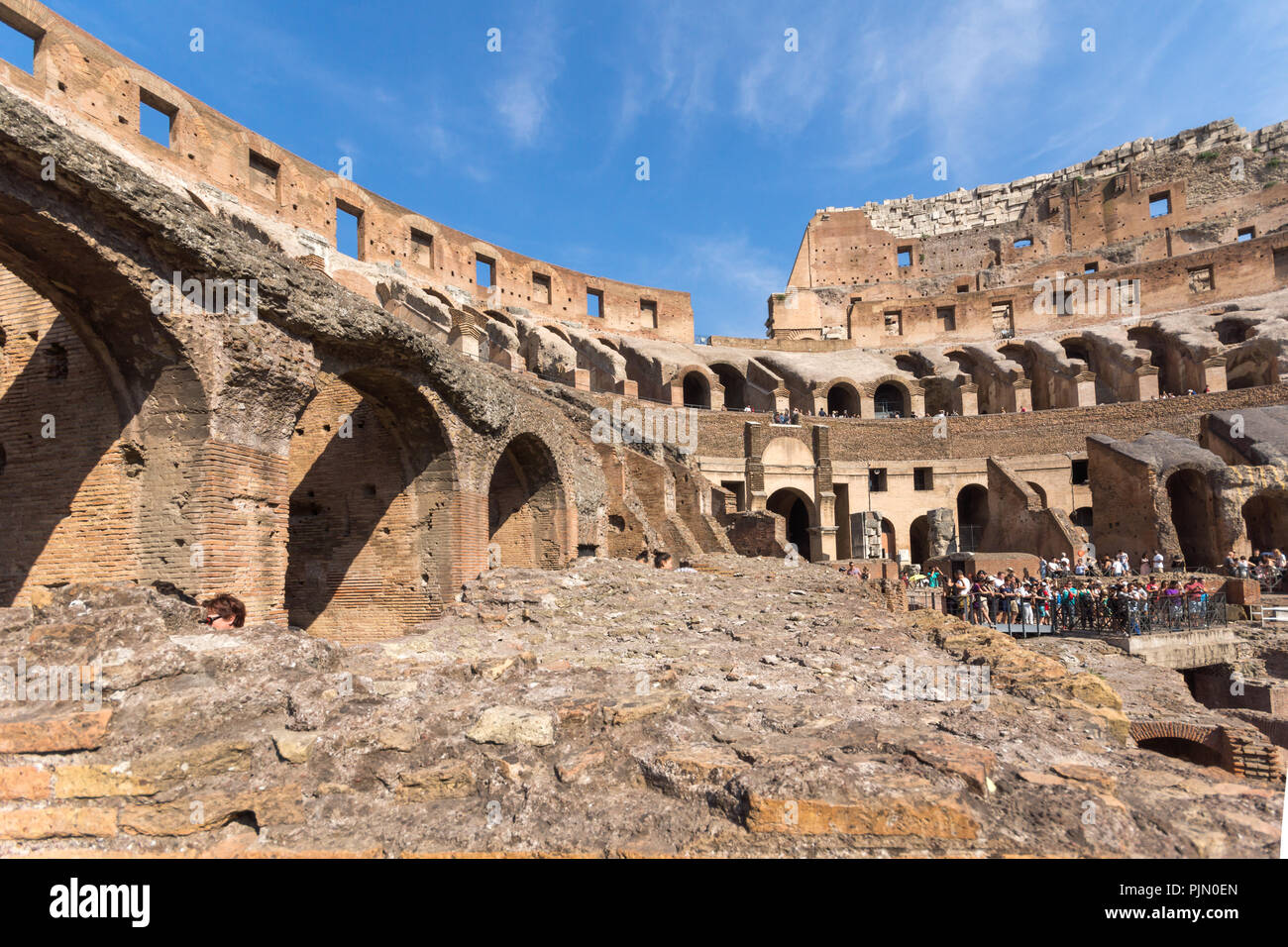 ROME, ITALY - JUNE 24, 2017: Tourists visiting inside part of Colosseum ...