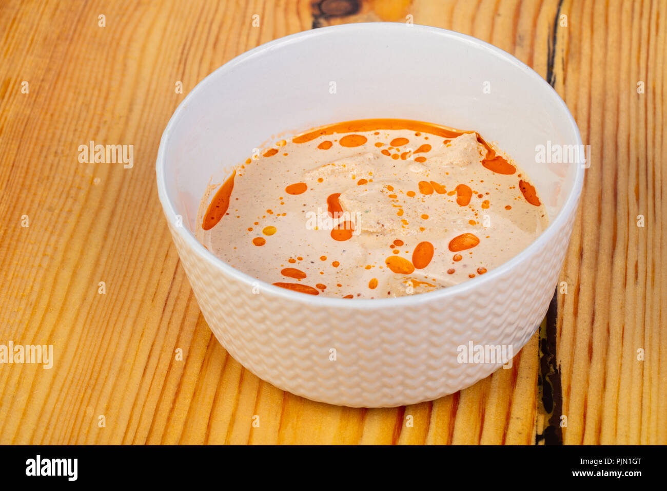 Georgian cuisine - Satsivi with chicken Stock Photo - Alamy