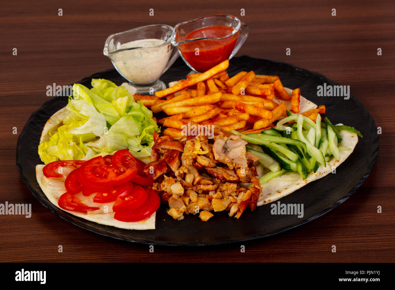 Shawarma with meat in the plate Stock Photo - Alamy