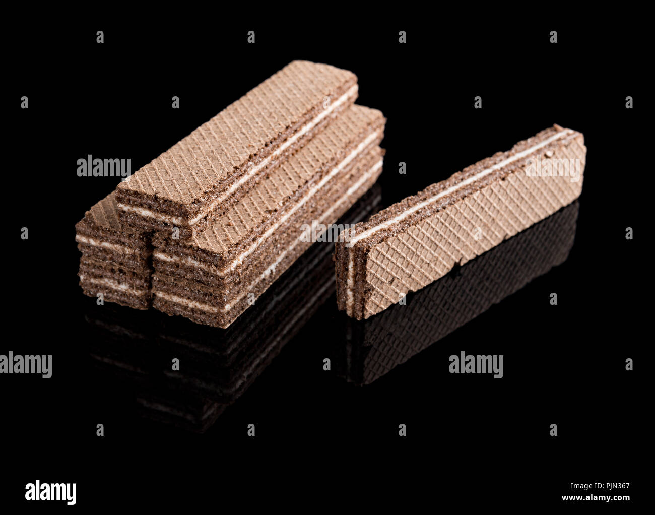 vanilla flavor wafer blocks on black background Stock Photo - Alamy