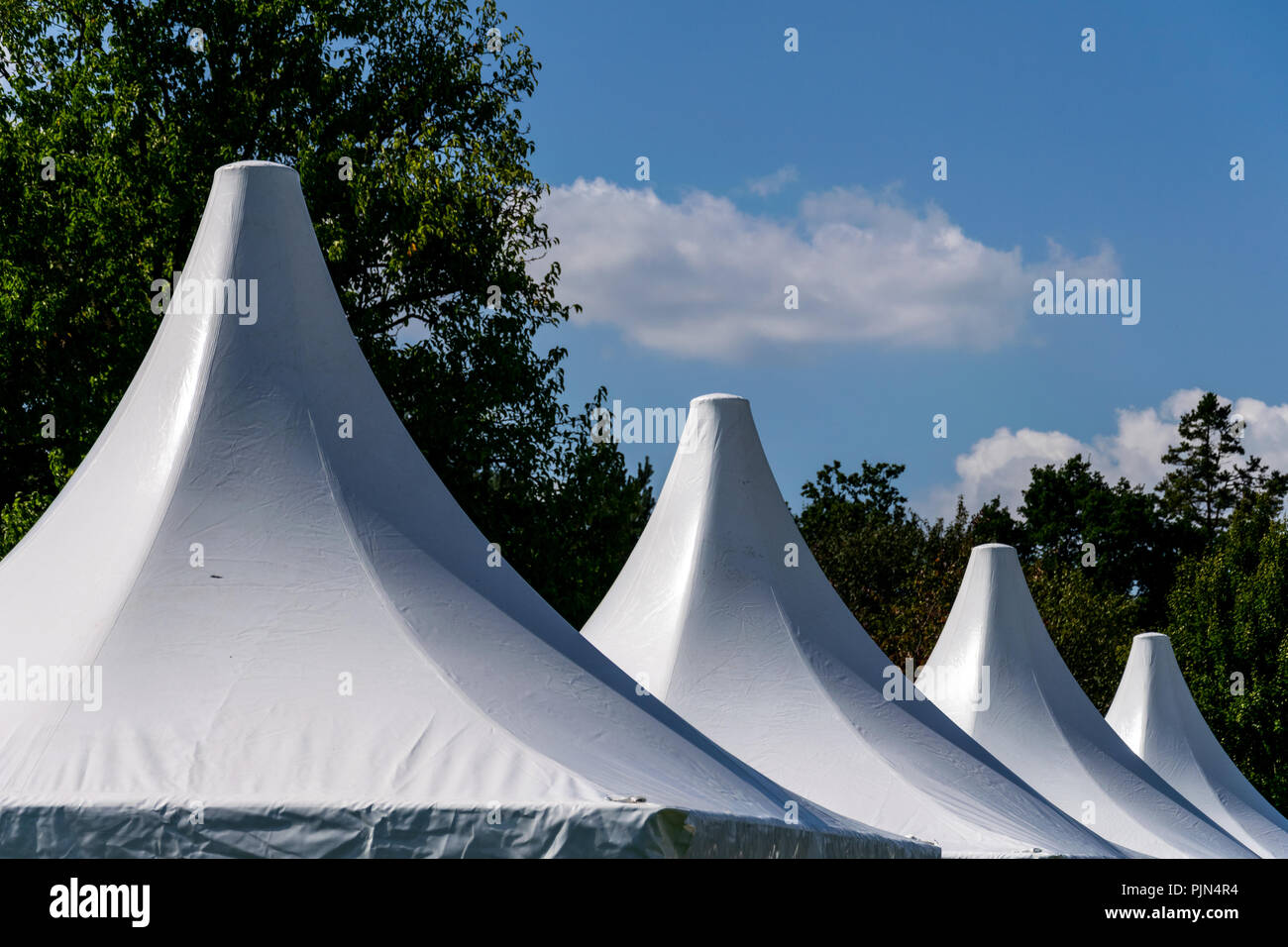 Marquee tops at outdoor event Stock Photo - Alamy