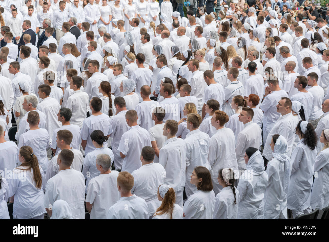 Kiev, Ukraine. July 22 2018 Men and women in white clothes prepare to ...