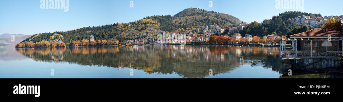 Fall scene of city with lake and autumn trees reflection Stock Photo ...