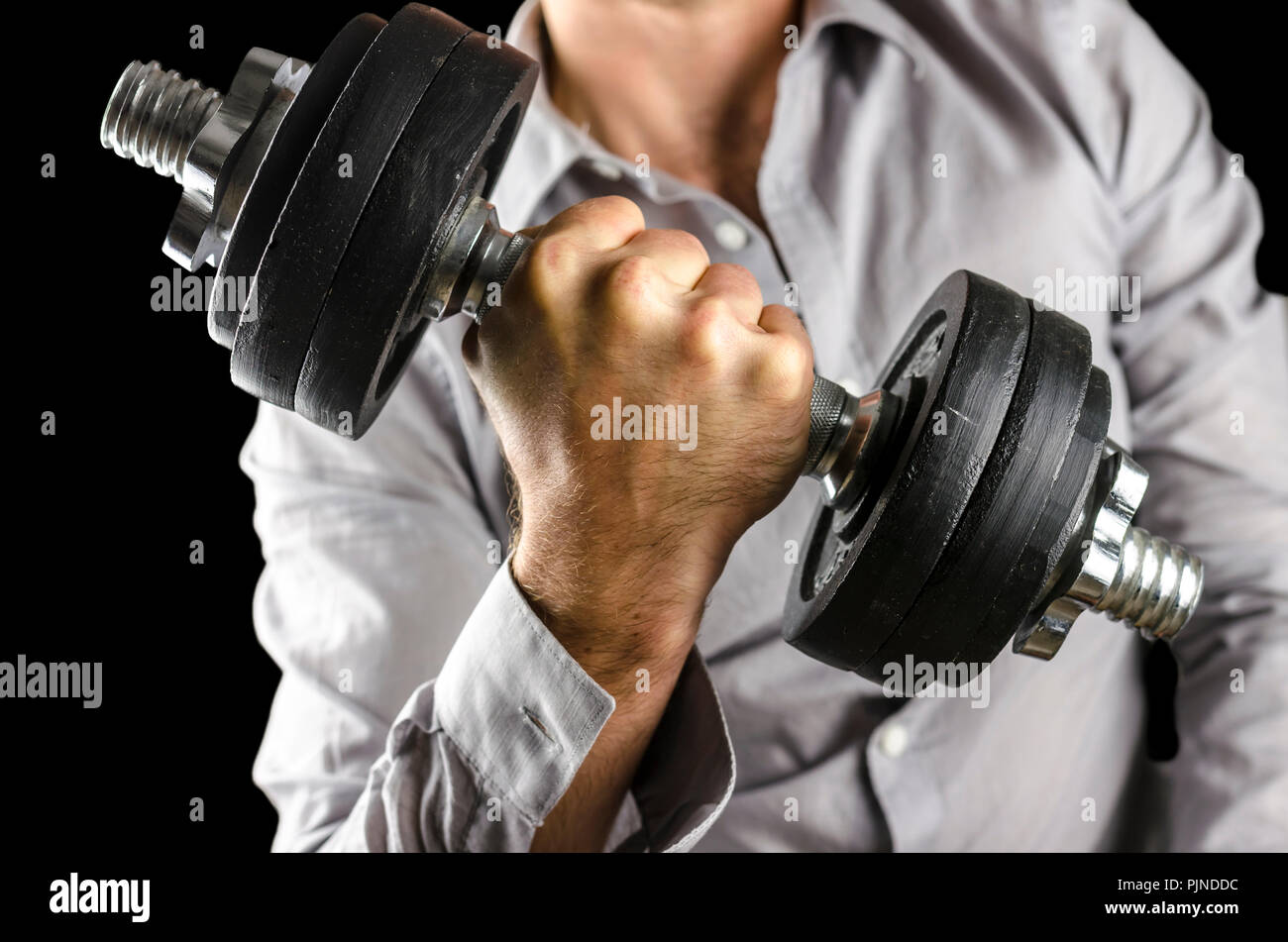 Businessman lifting weights hi-res stock photography and images - Alamy