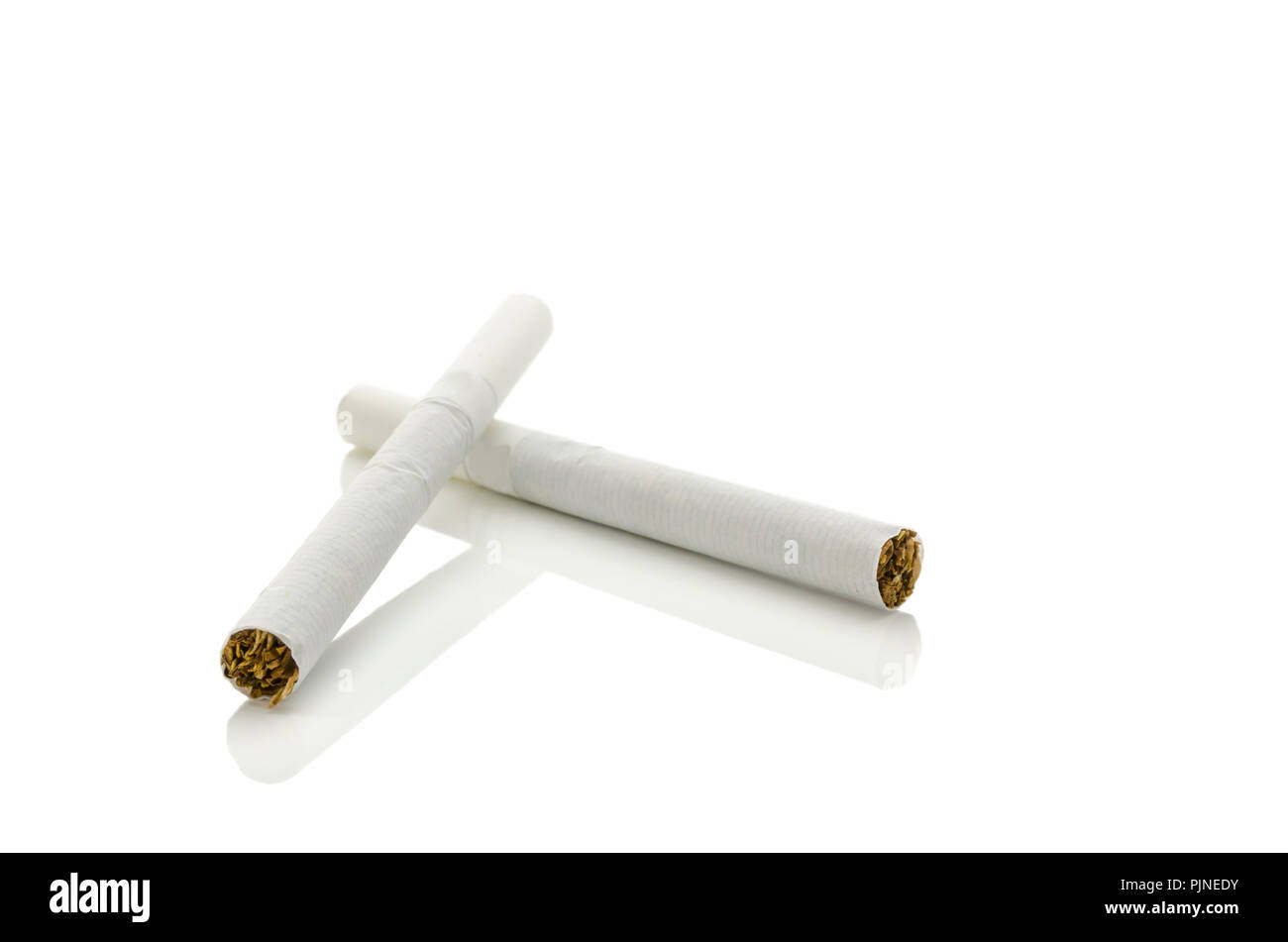 Two cigarettes isolated over white background with reflection Stock ...