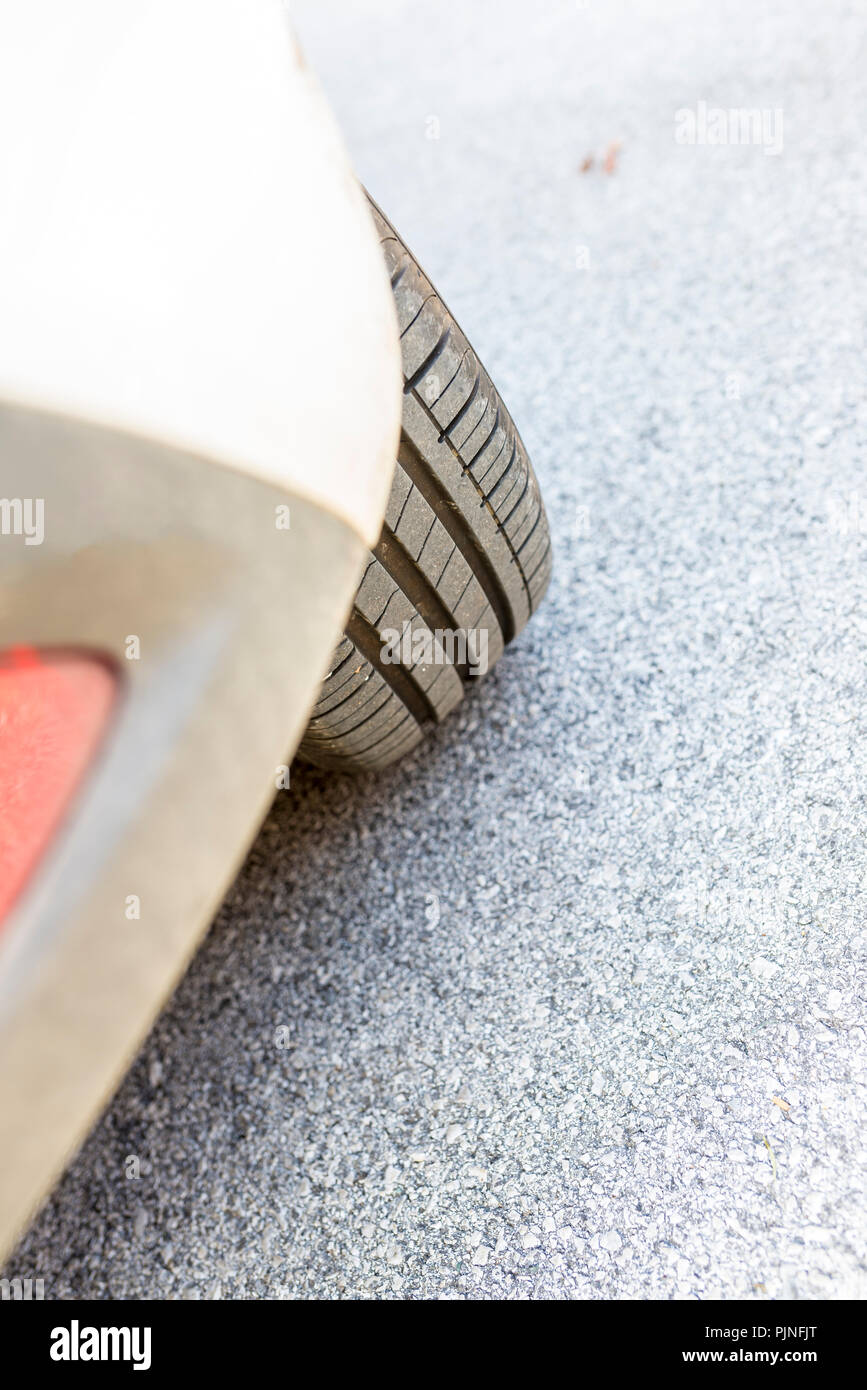 Rear view of car tire Stock Photo - Alamy