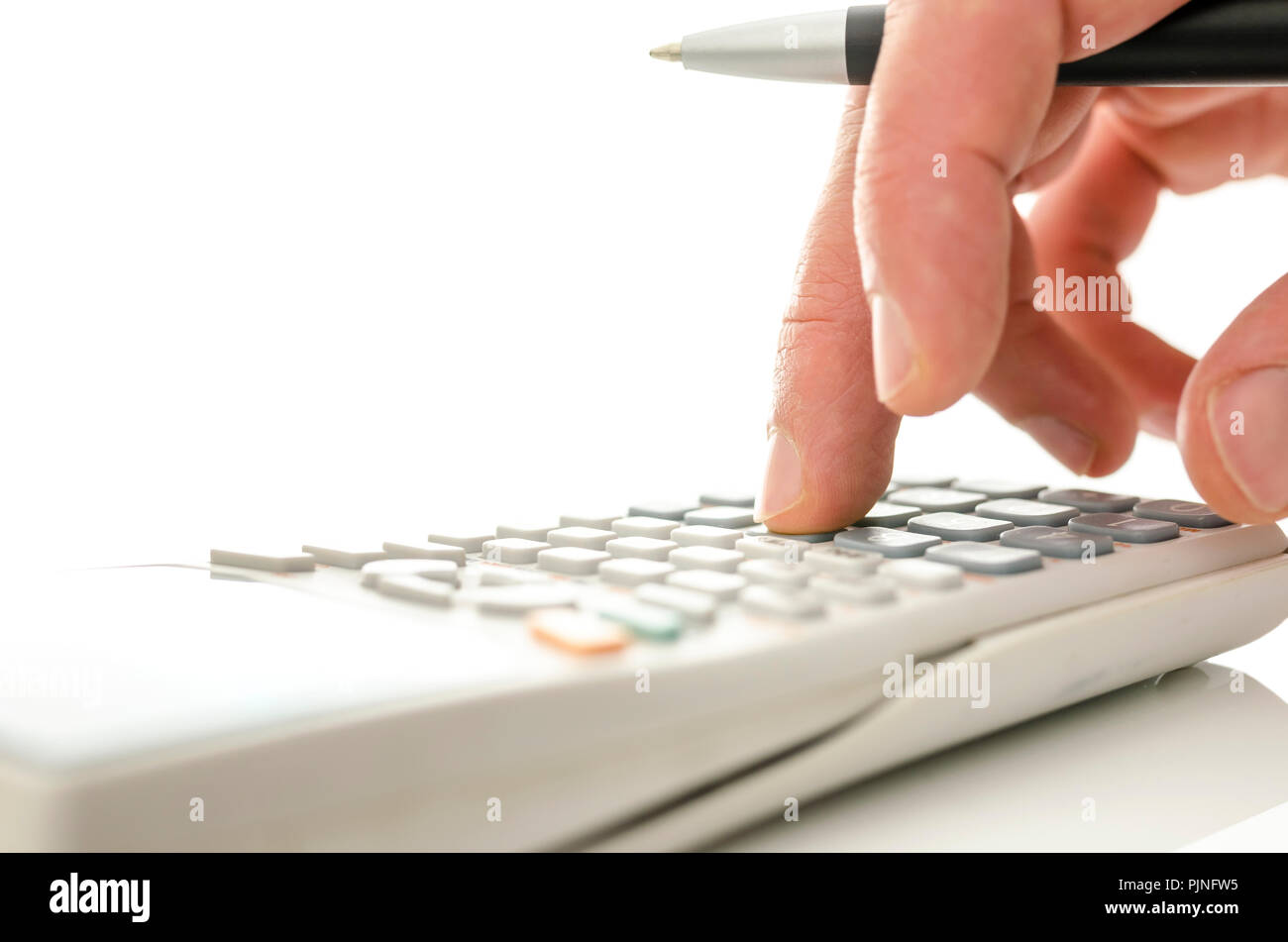 Male hand using calculator Stock Photo - Alamy