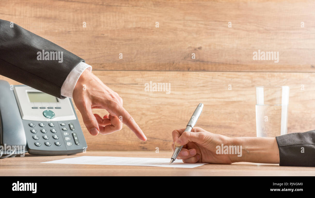 Conceptual Businessman Pointing his Index Finger at the Contract on the ...