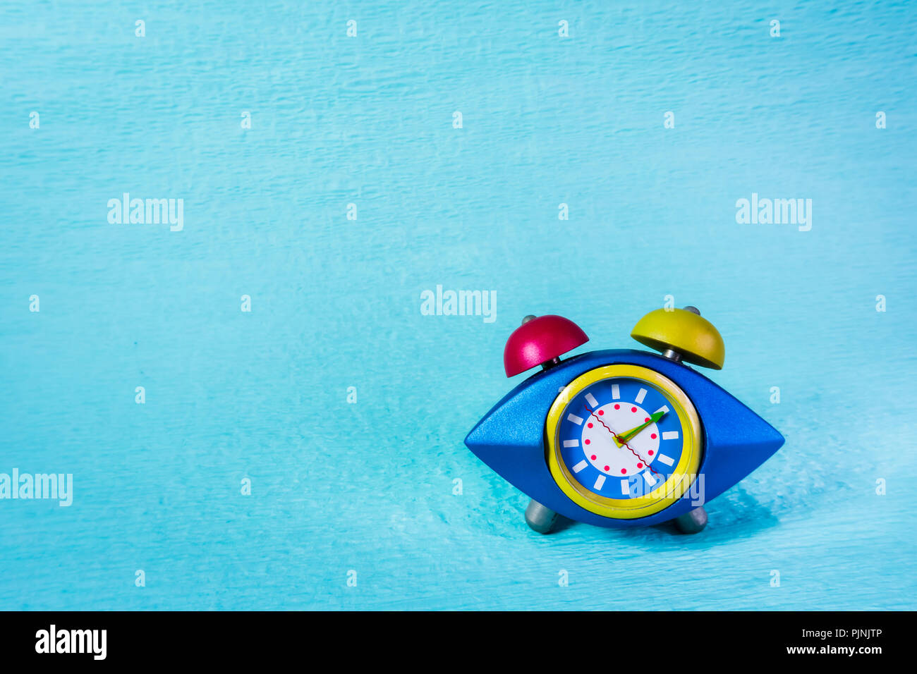 Little blue alarm clock hi-res stock photography and images - Alamy