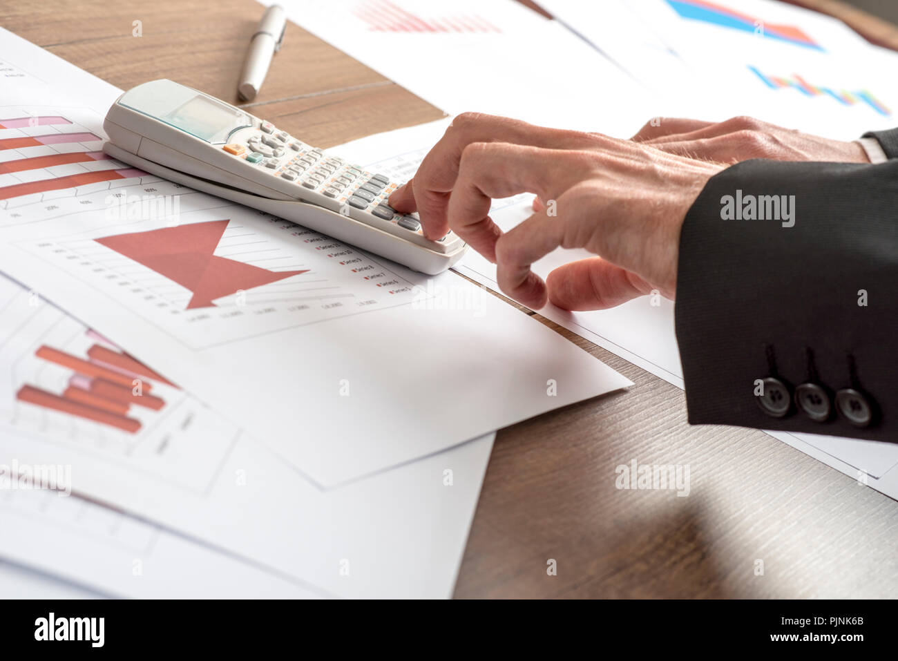 Reviewing charts hi-res stock photography and images - Alamy