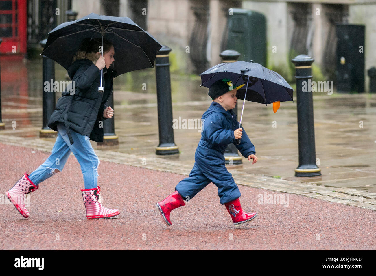 Kids soaked in rain hi-res stock photography and images - Alamy