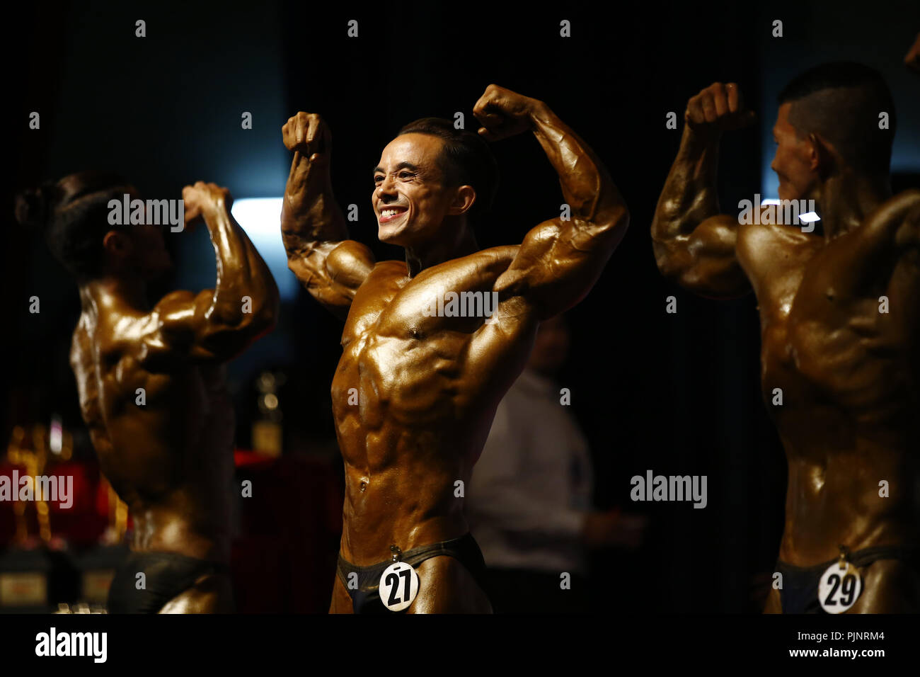 Kathmandu, Nepal. 8th Sep, 2018. Nepalese body builders pose on stage ...