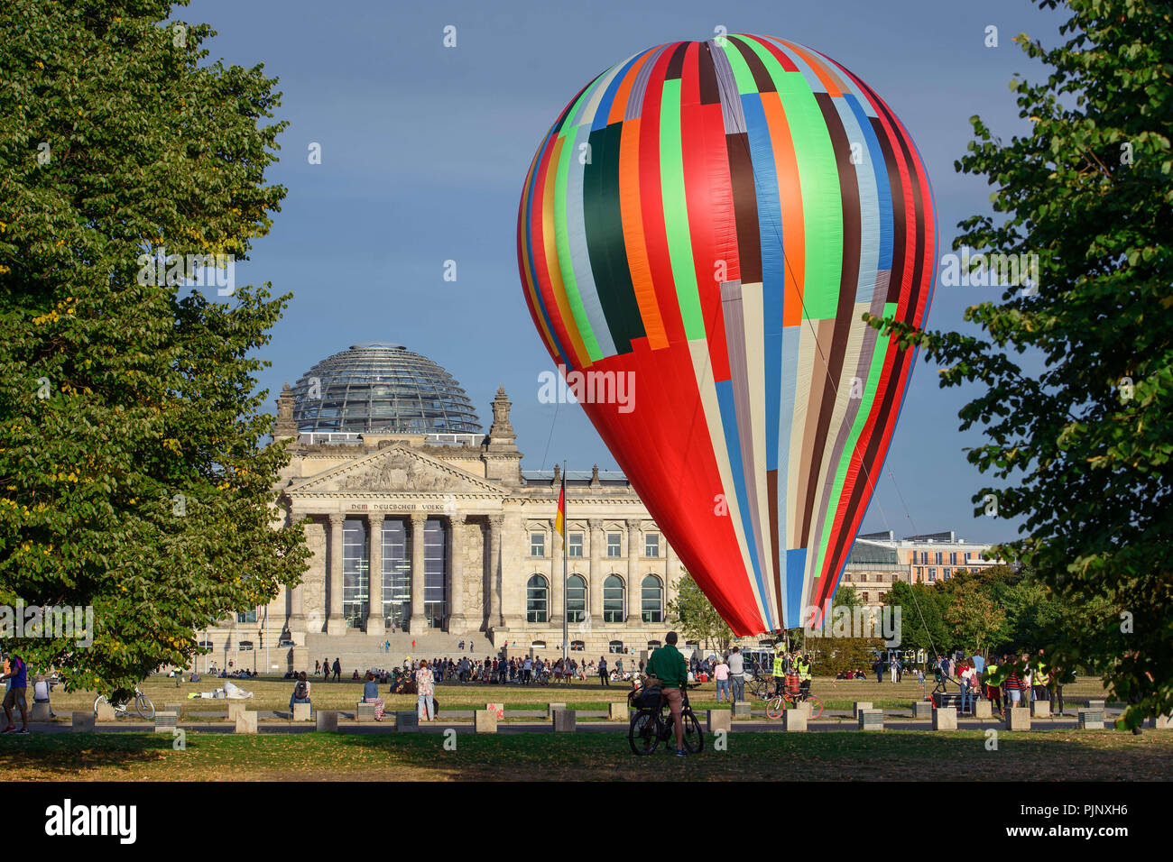 Hamburg, Germany. 08th Sep, 2018. A colorful hot air balloon stands for ...