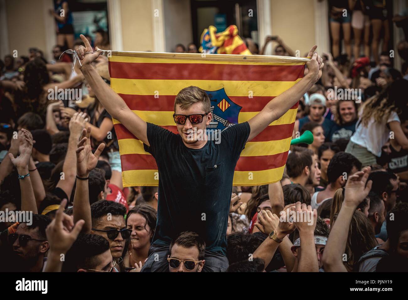 Mahon, Spain. 8 September, 2018: A boy dances in between the cheering ...