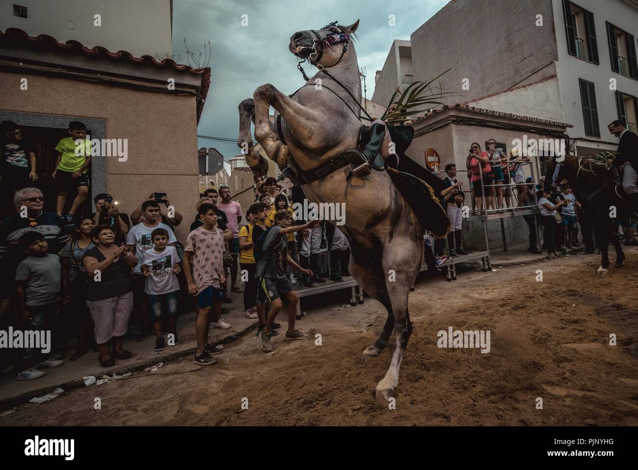 Mahon, Spain. 8 September, 2018: A 'caixer' (horse rider) rears up on ...