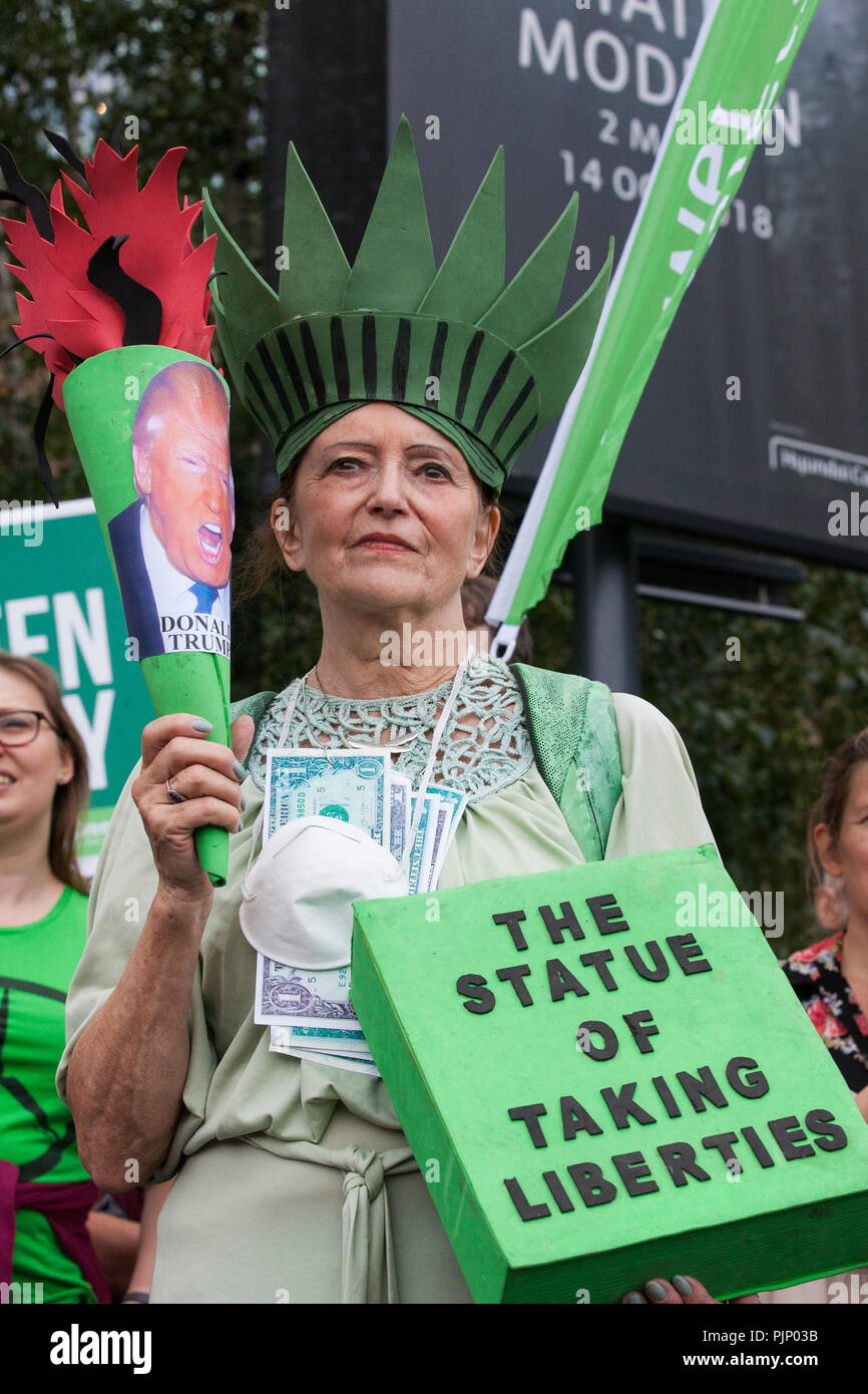 London, UK. 8th Sep, 2018. Environmental campaigners hold a rally ...