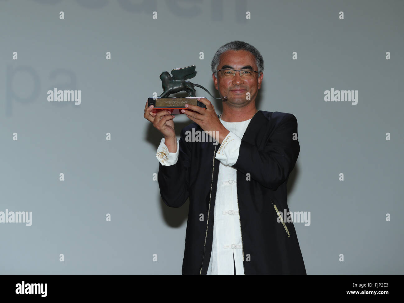 Venice, Italy. 8th Sep, 2018. China's Tibetan writer-director Pema Tseden poses with the Best ...