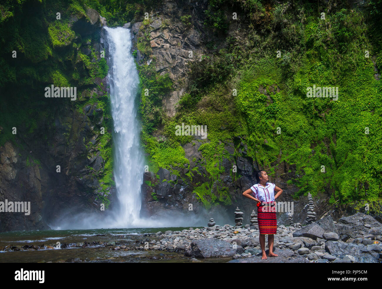 Girl from Ifugao Minority near a waterfall in Batad the Philippines ...
