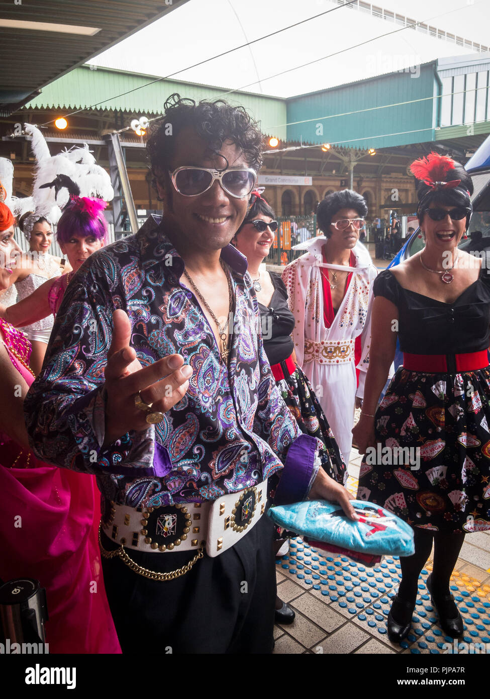 Elvis look-a-likes and fans gathered at Sydney Central Station to board ...