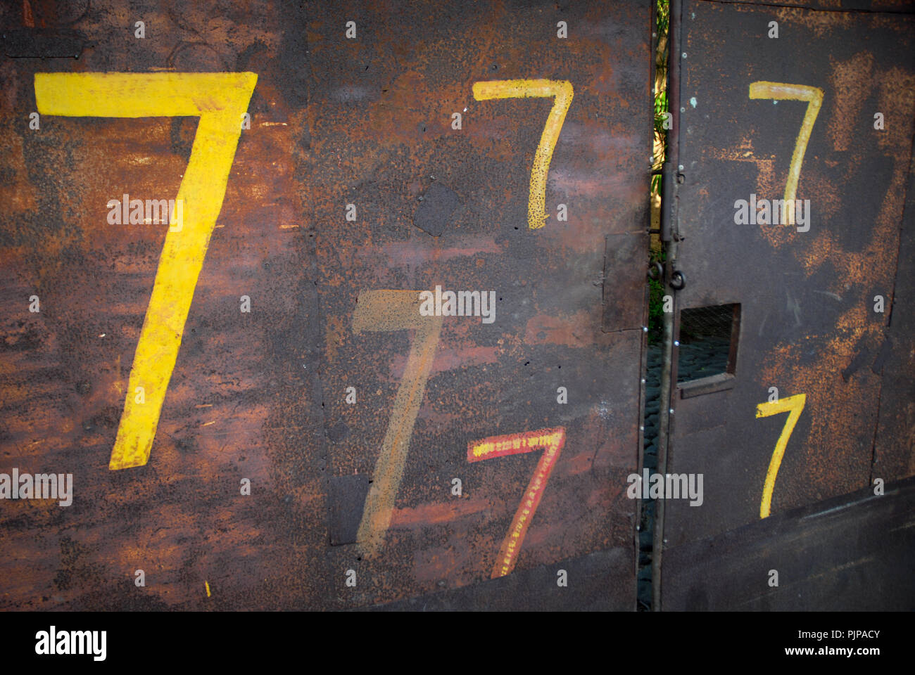 Number 7 painted on gate, Seminyak, Bali, Indonesia Stock Photo - Alamy