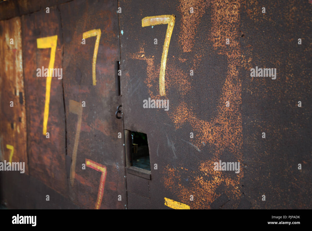 Number 7 painted on gate, Seminyak, Bali, Indonesia Stock Photo - Alamy