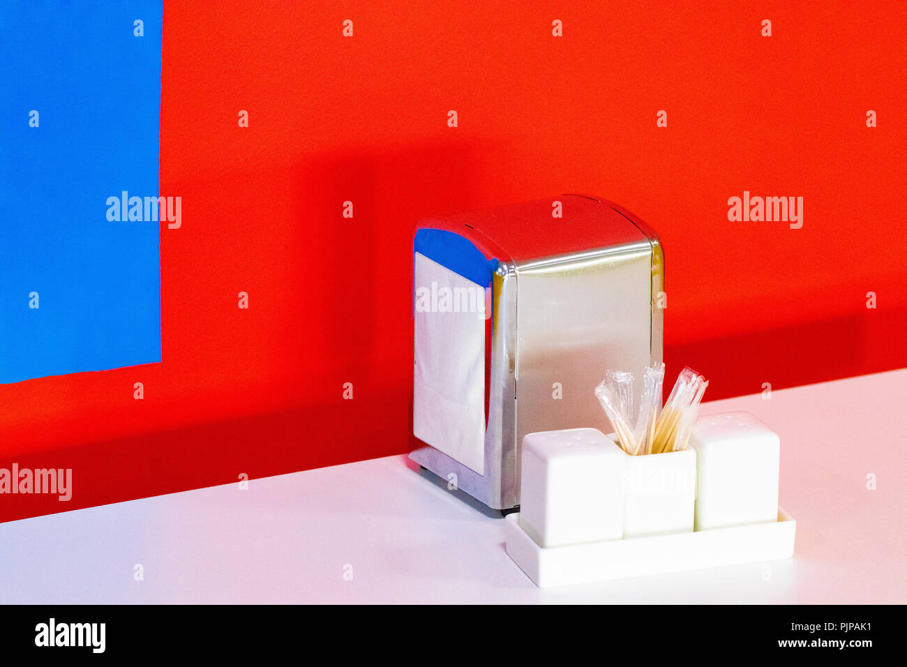 A restaurant or cafe table top set up on a white background with copy ...